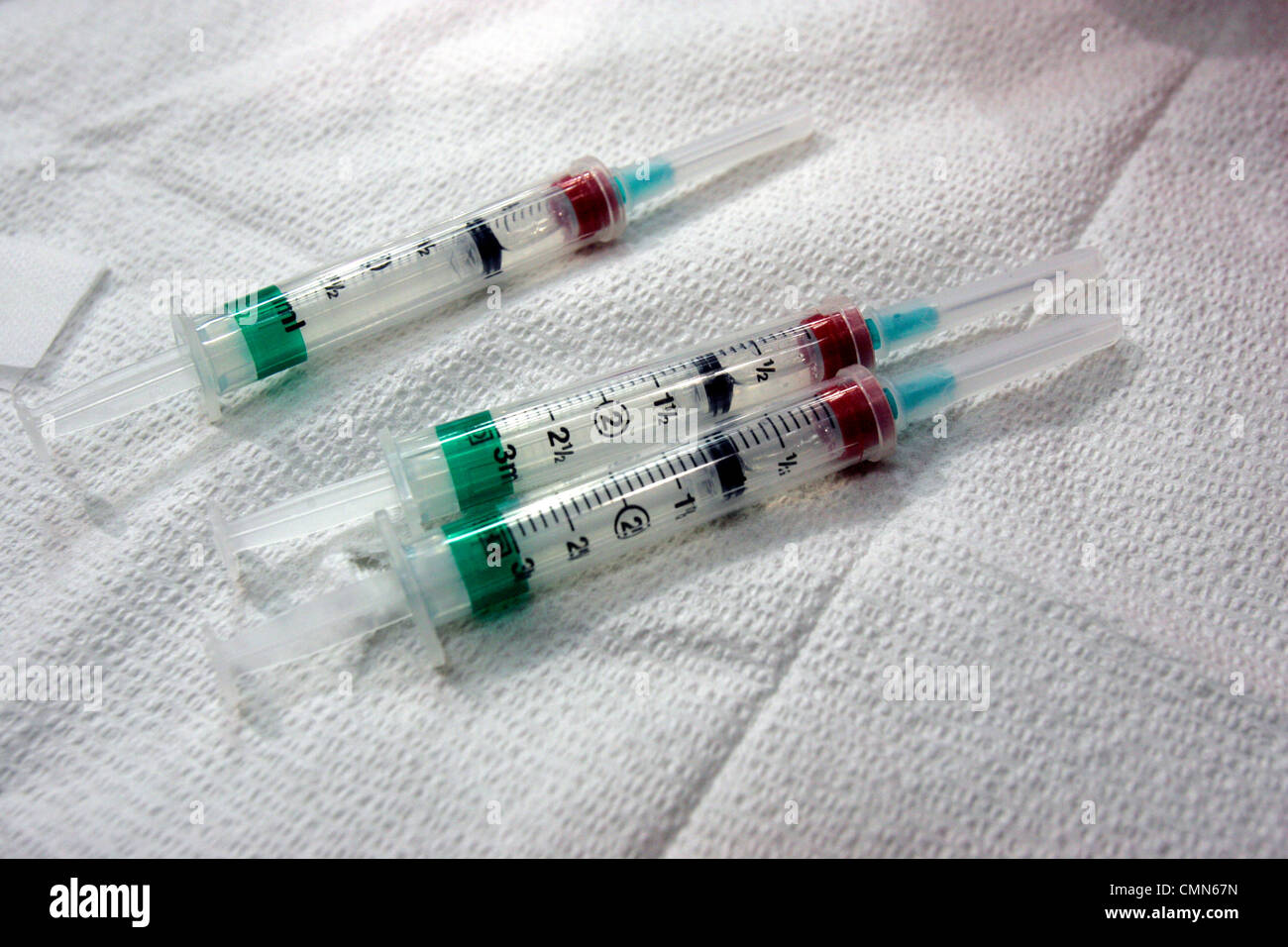 Flu vaccine syringes Stock Photo - Alamy