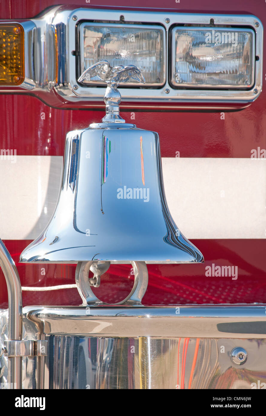 Traditional chrome bell on the front bumper of a firetruck Stock Photo ...