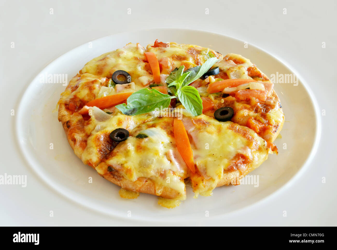 homemade pizza with ham and delicious cheese Stock Photo - Alamy