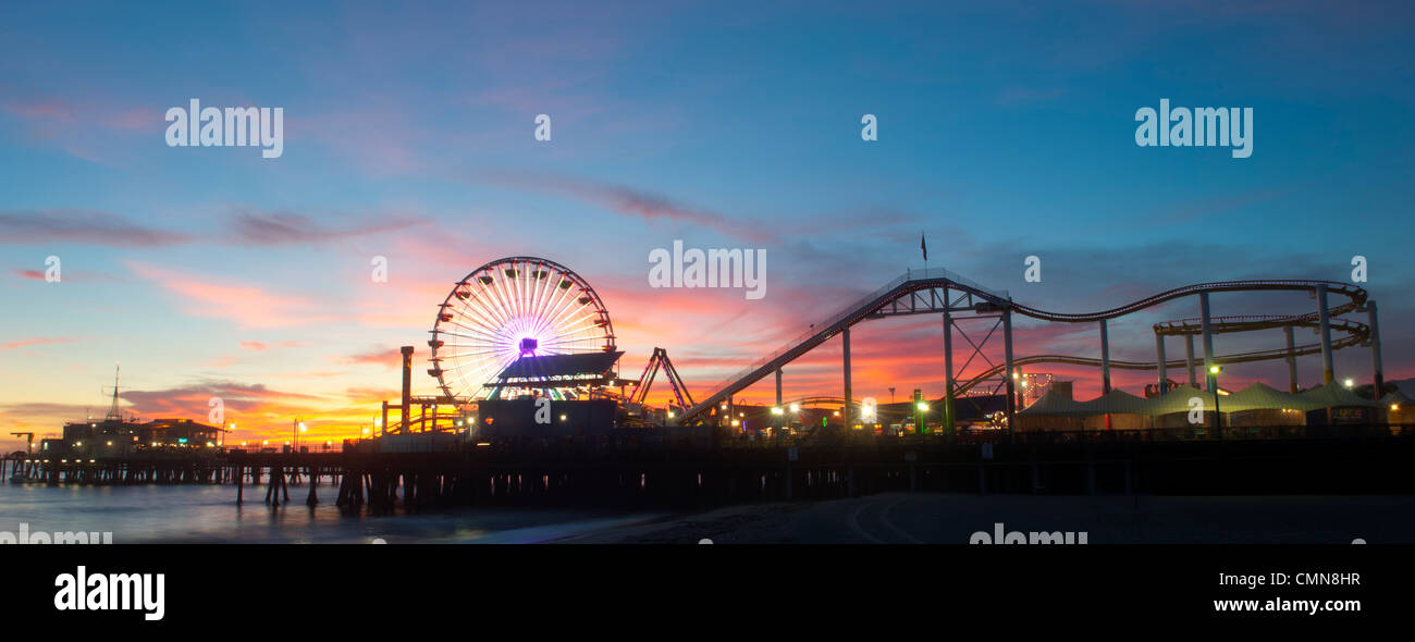 Amusement park on waterfront at night Stock Photo - Alamy