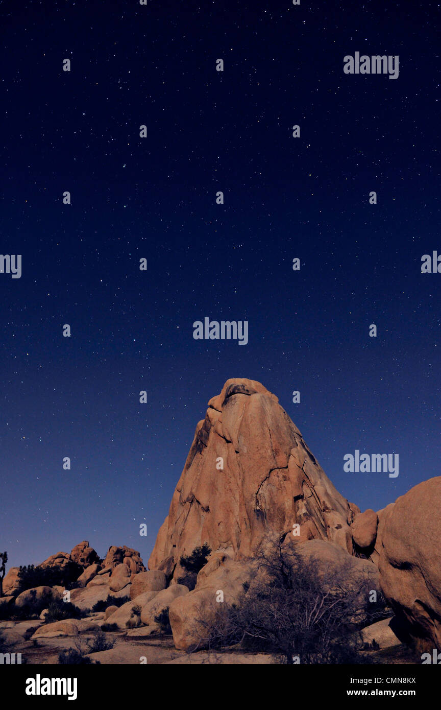 Stars in sky over desert Stock Photo - Alamy