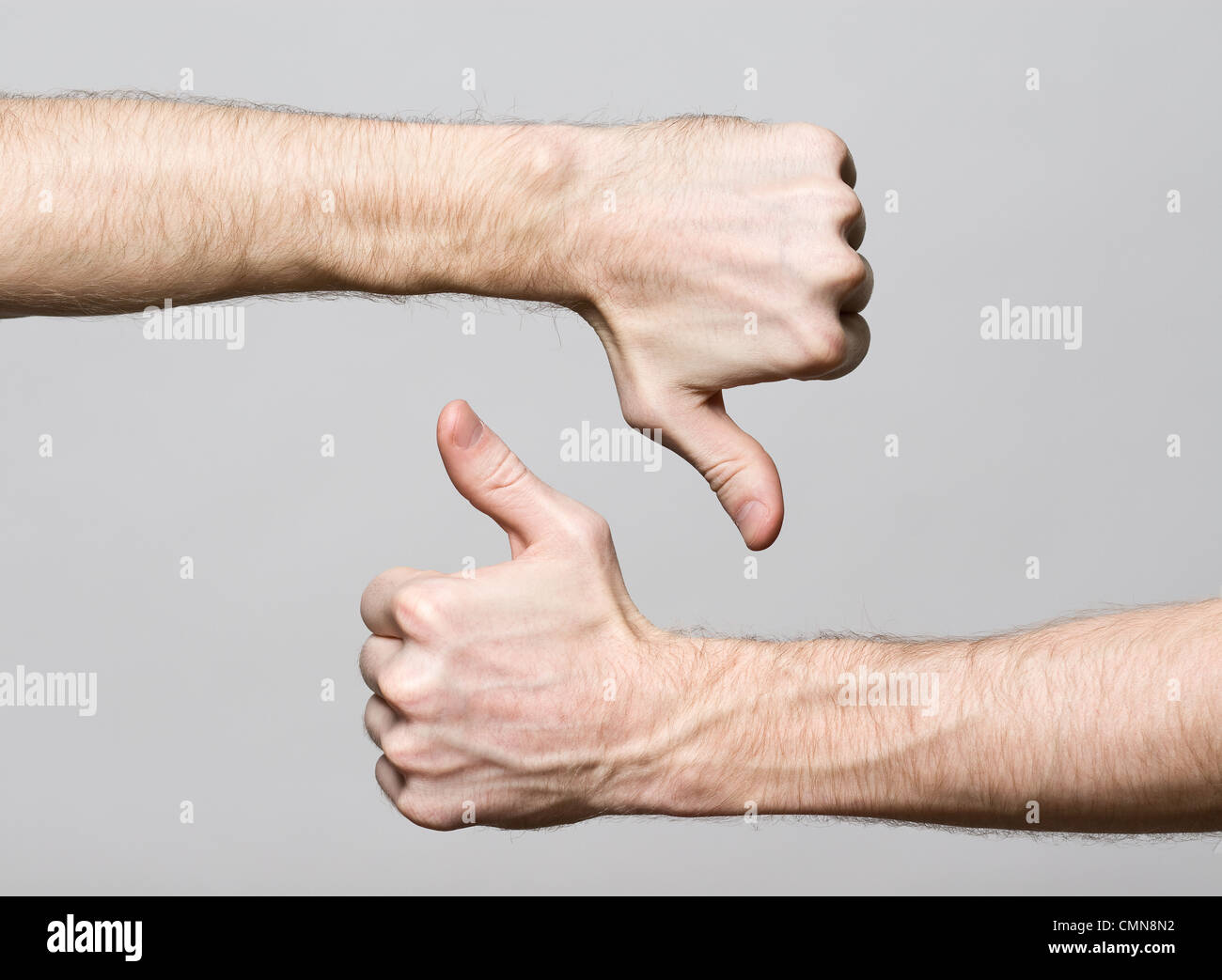 Realistic facebook 'like' (and 'dislike') Two left thumbs - one up and ...