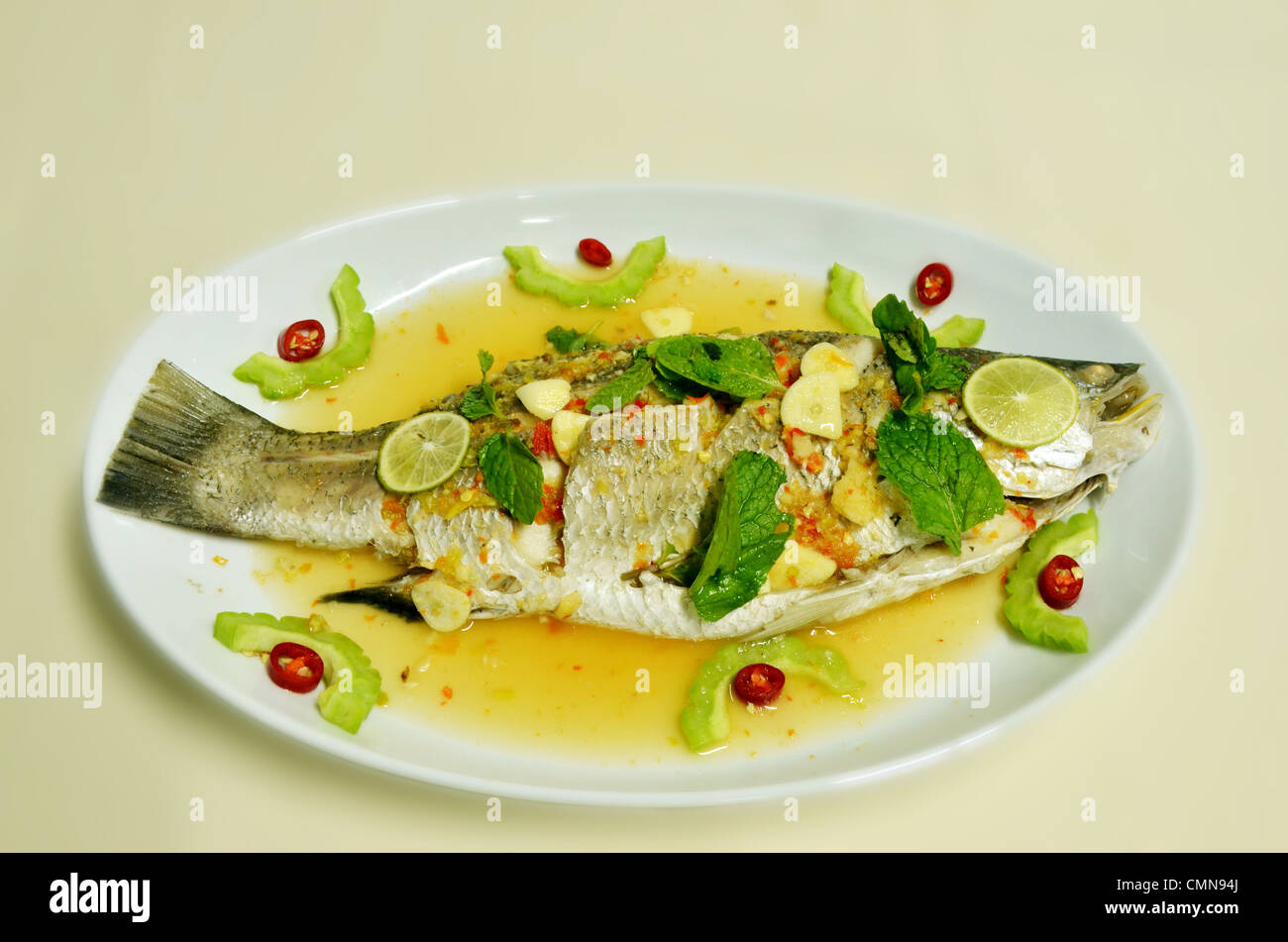 Steamed snapper fish with lemon ,spicy food Stock Photo - Alamy