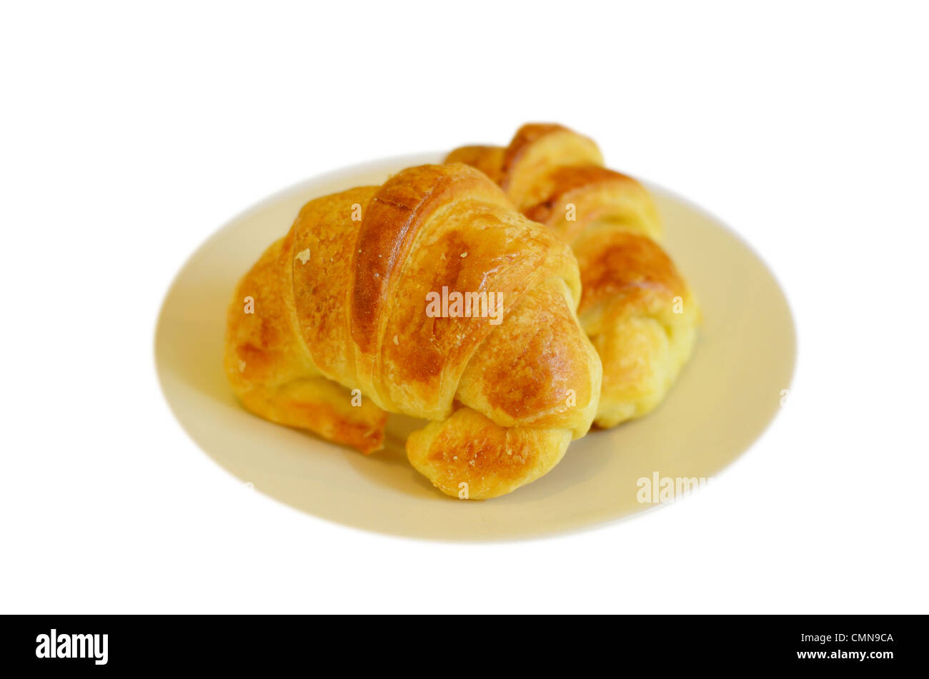 two fresh croissant ,casting soft whadow on white Stock Photo - Alamy