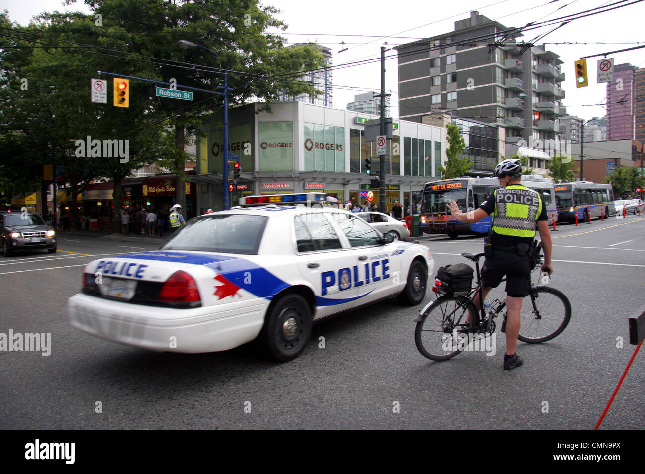 Officer male man policeman bicycle cycle cycles british hi-res stock ...