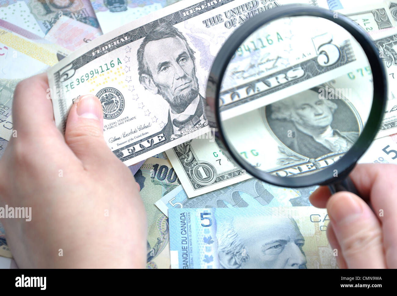 Seeking fake bill Stock Photo - Alamy