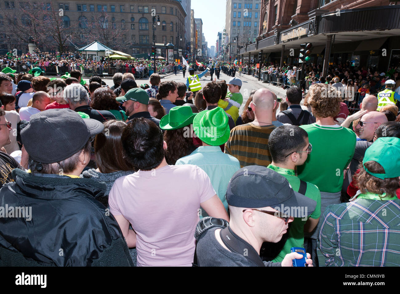 Crowd on the street watching parade hi-res stock photography and images ...