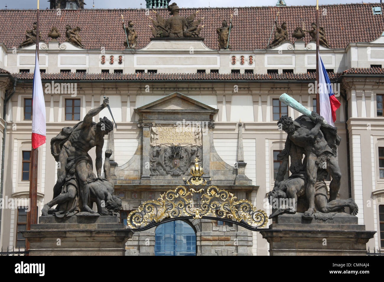 Entrance gate to Prague Castle with gruesome statues Stock Photo - Alamy