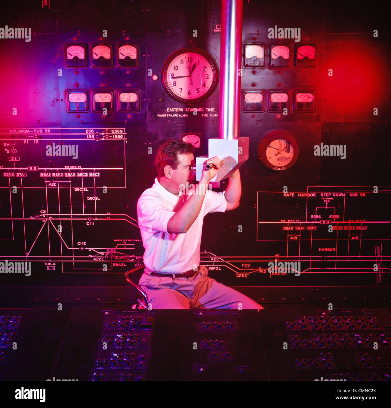 Male executive looking through periscope Stock Photo - Alamy