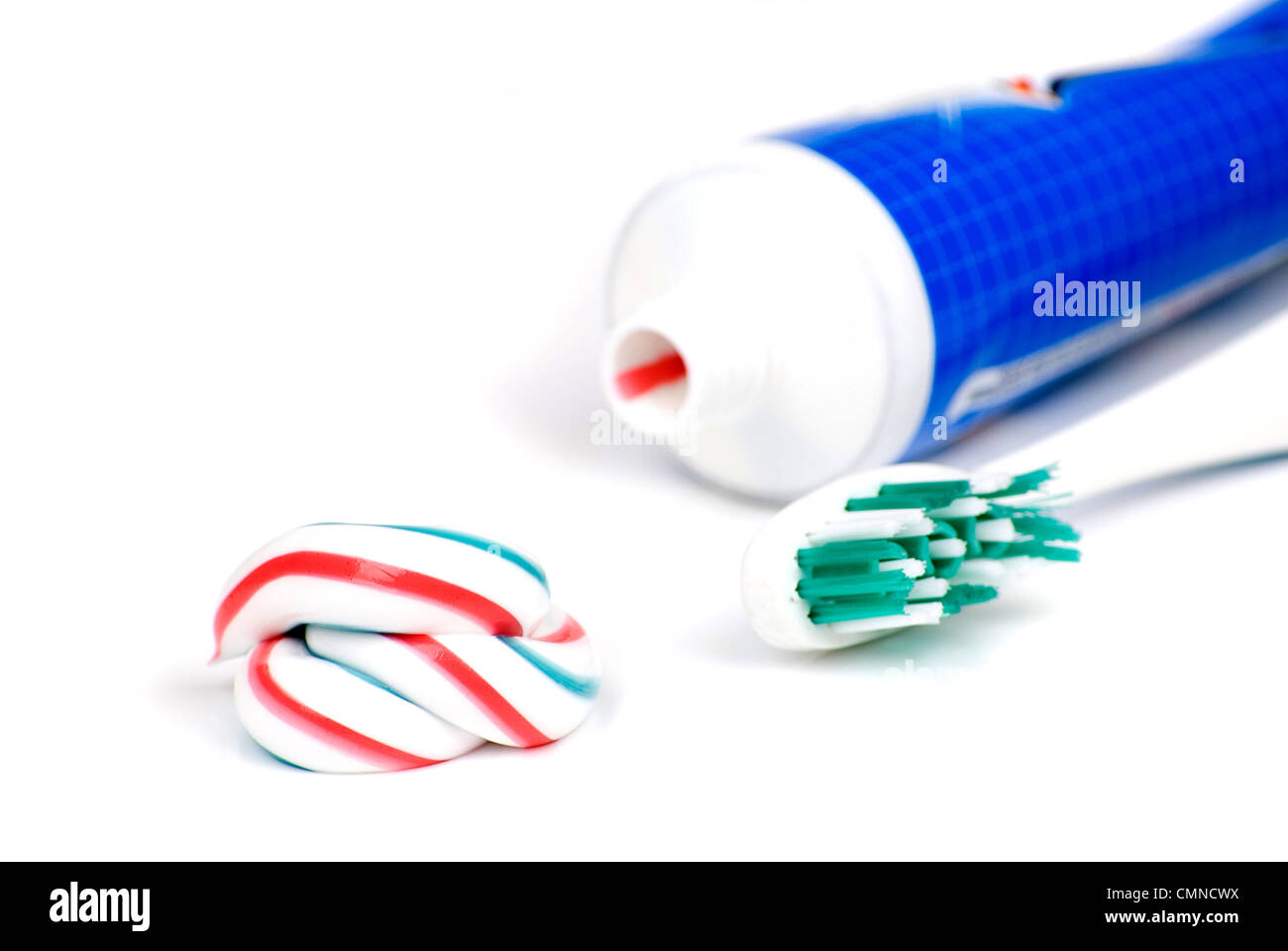 white red and blue squeezed toothpaste isolated on a white background ...
