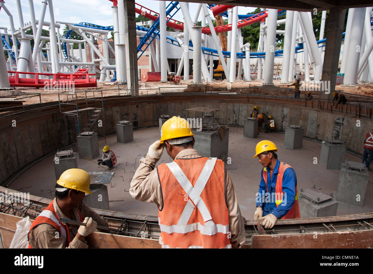 Migrant workers from China work on the construction site of Resorts ...