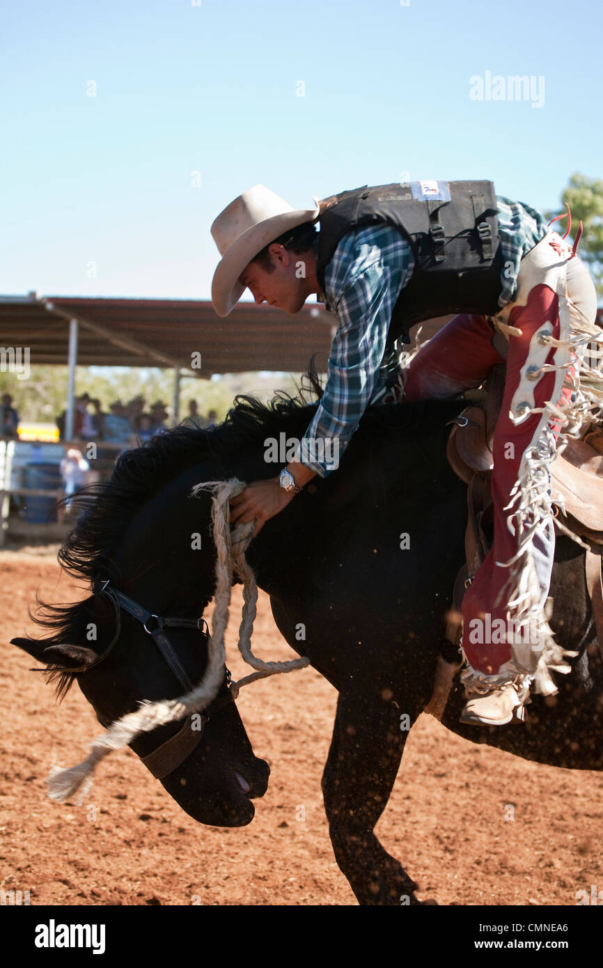 Saddle bronc competitor in action at Chillagoe Rodeo. Chillagoe ...