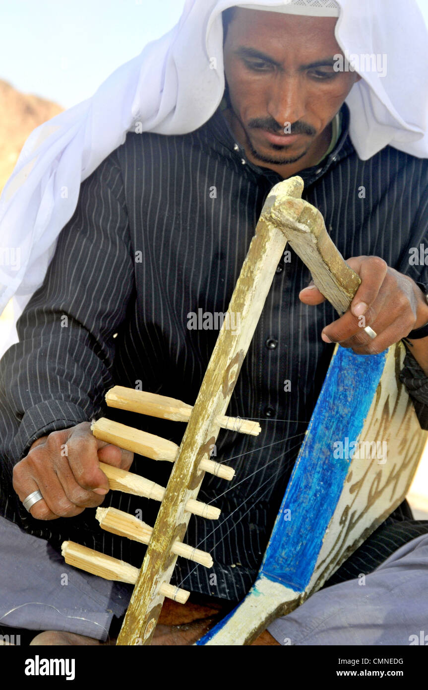 Series of preparing and playing a traditional middle east hand made ...