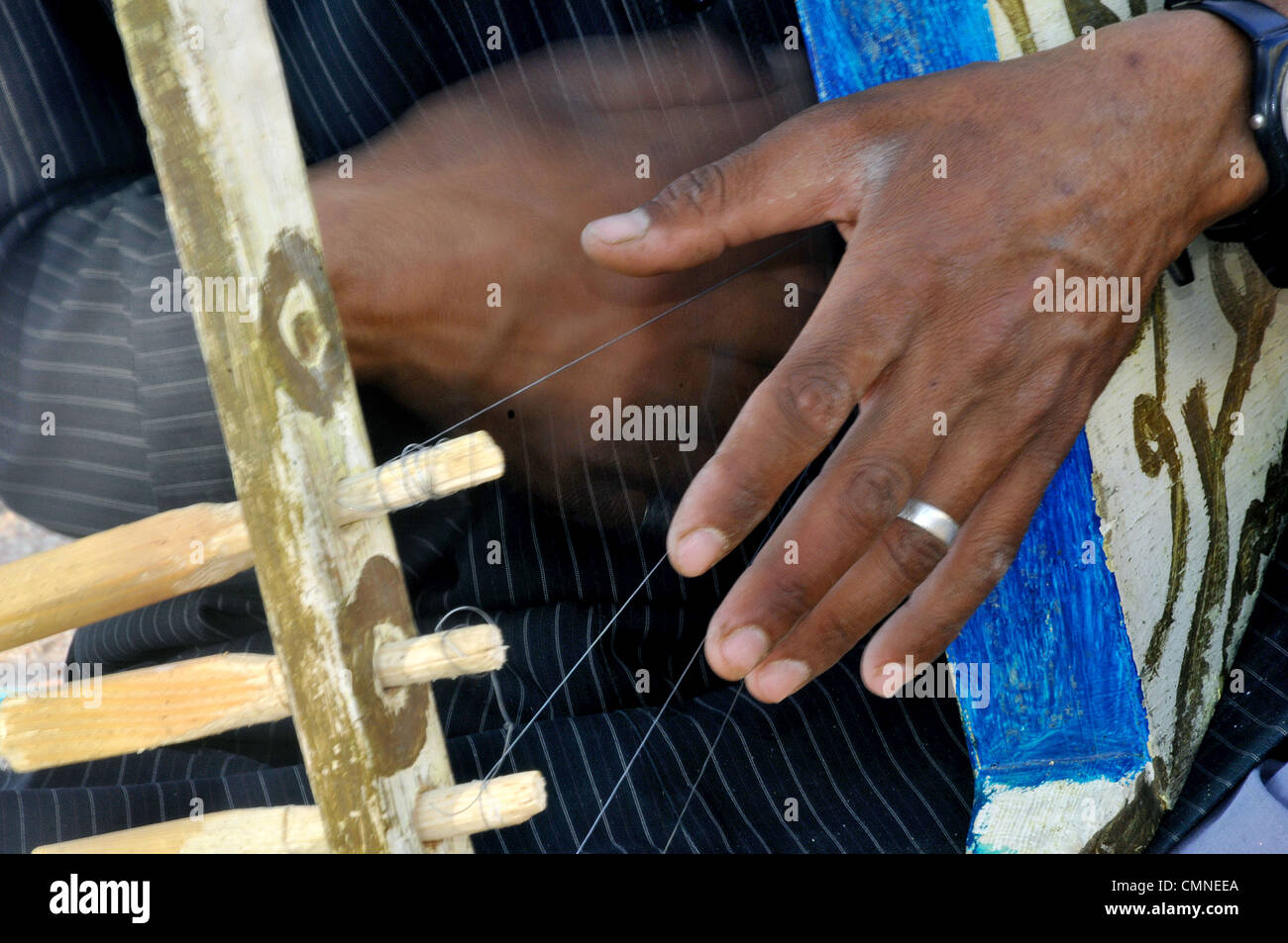 Series of preparing and playing a traditional middle east hand made ...