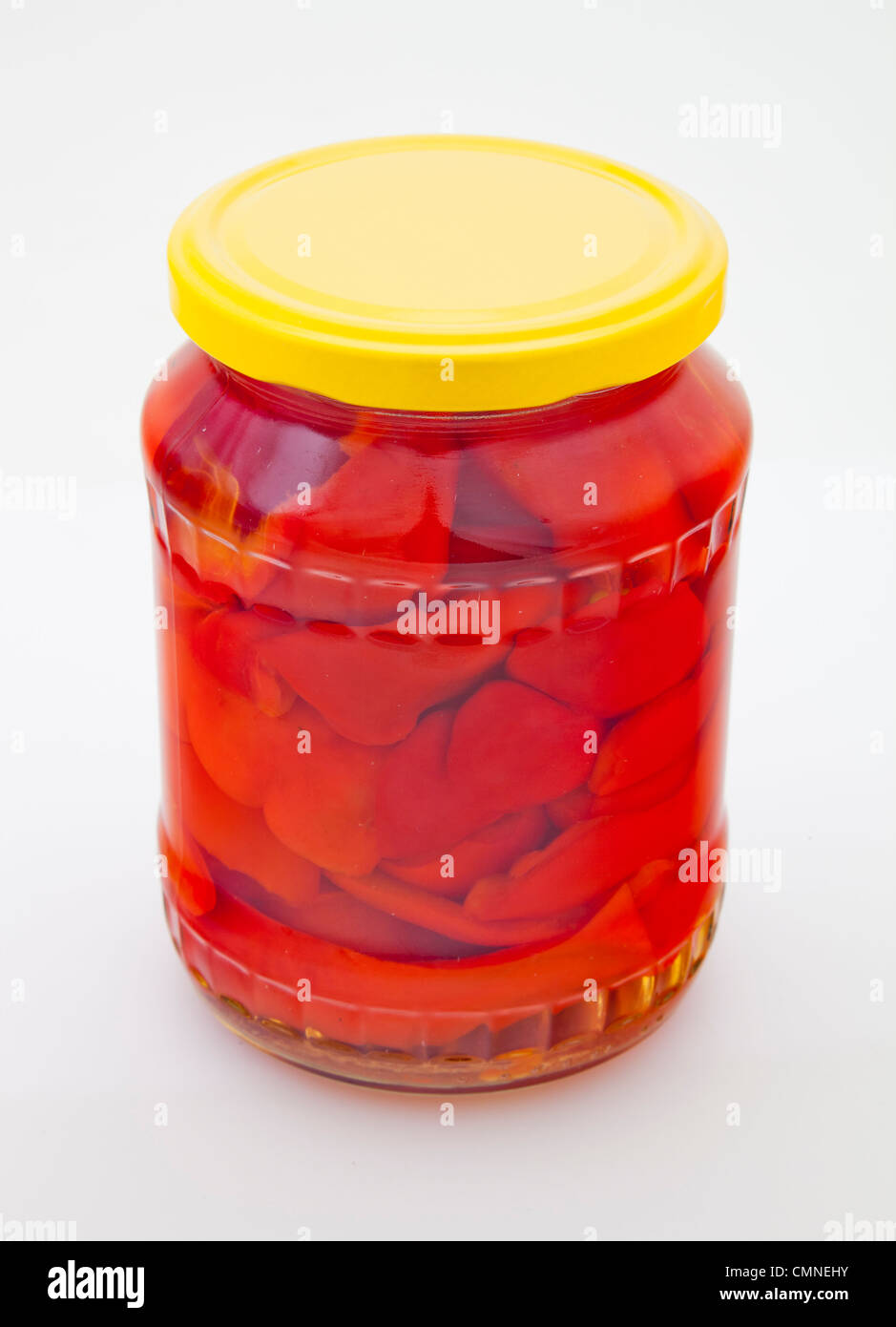 Pickled red bell pepper in the jar Stock Photo - Alamy
