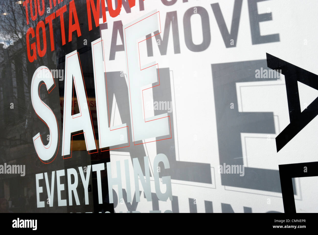 Eye catching ' SALE ' signs in a shop window Stock Photo - Alamy