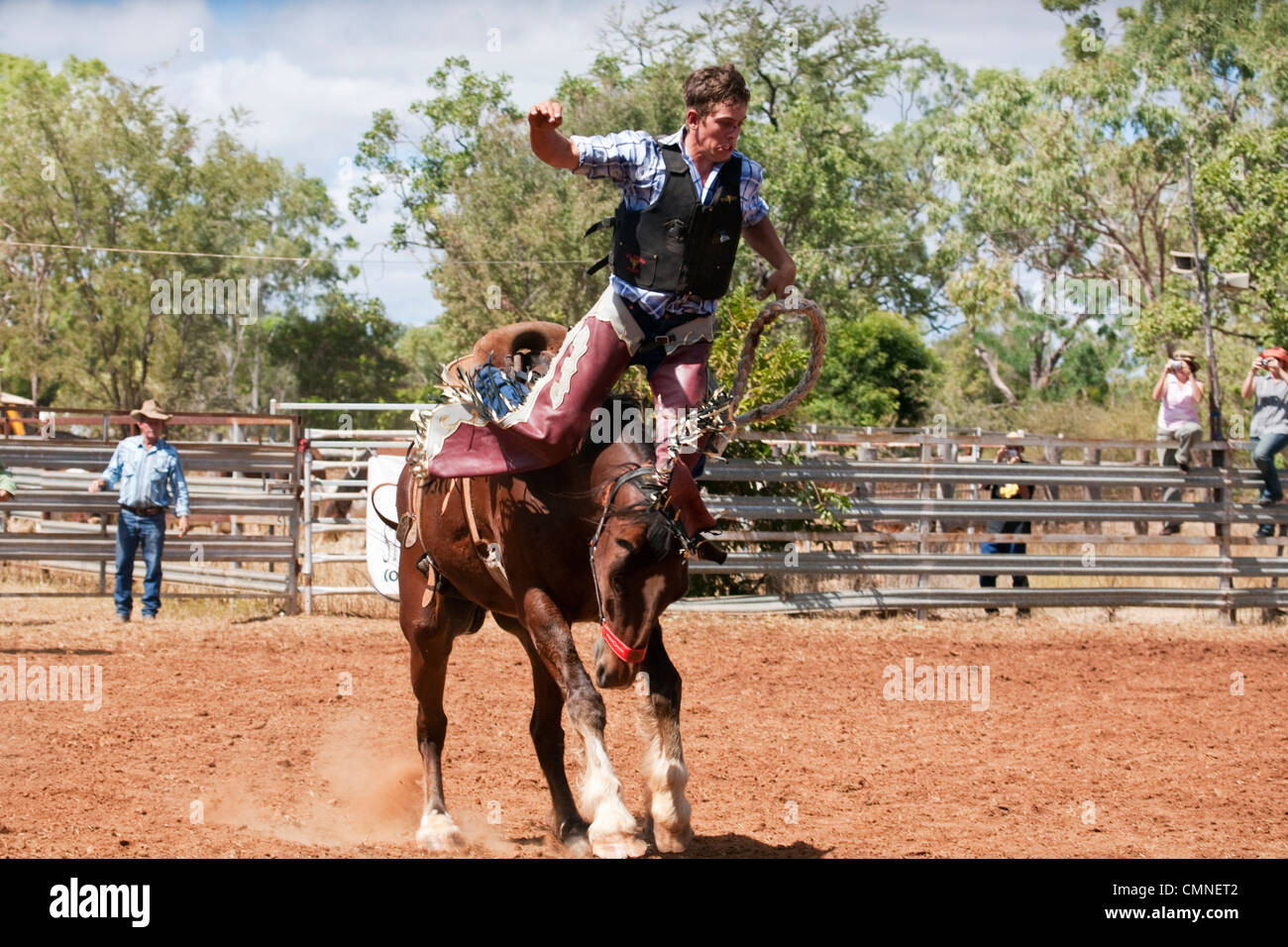 Saddle bronc rider getting buck from his horse. Chillagoe Rodeo ...