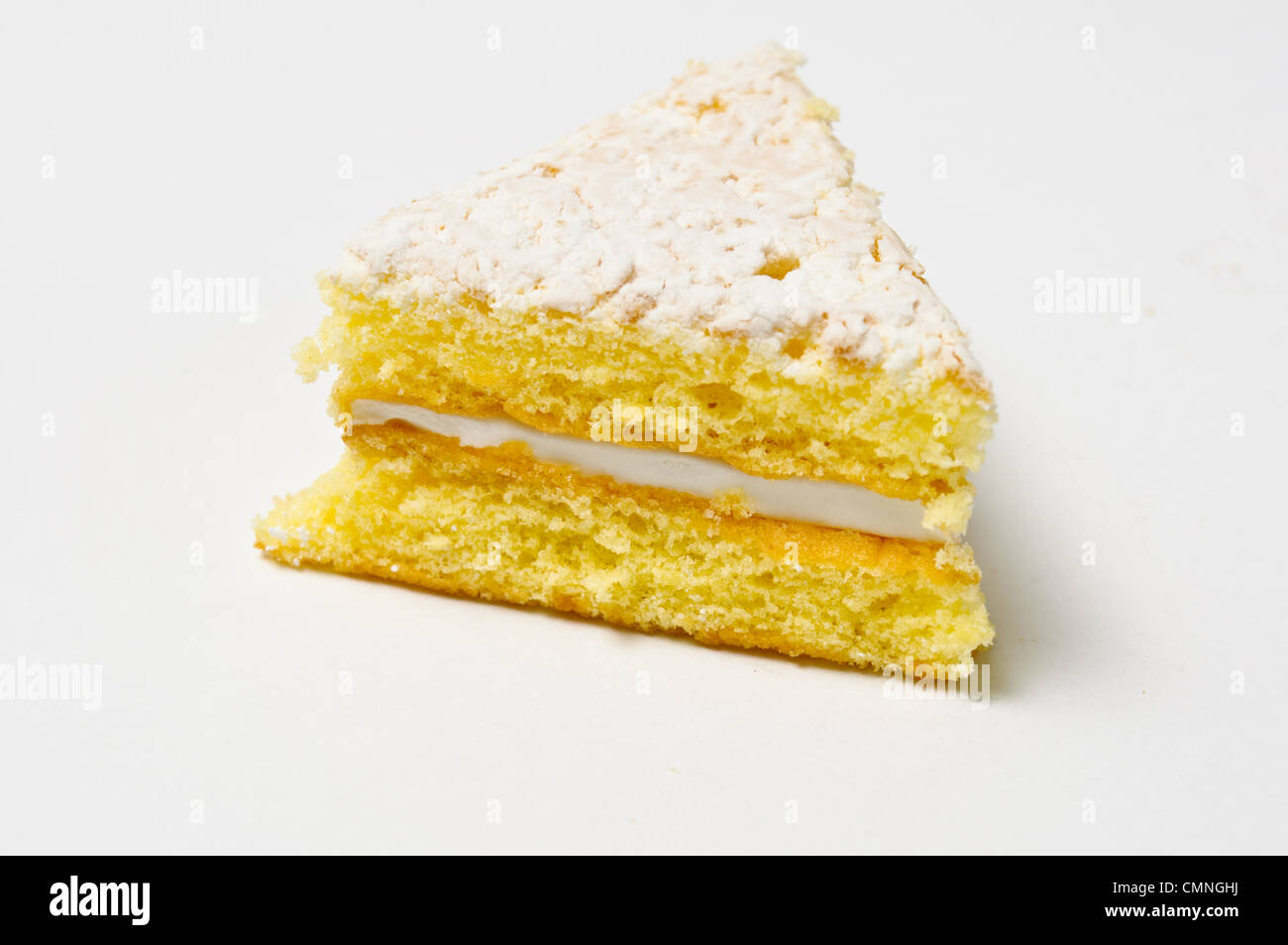 Side of the Triangle of sponge cookie with skimming filling isolated on ...