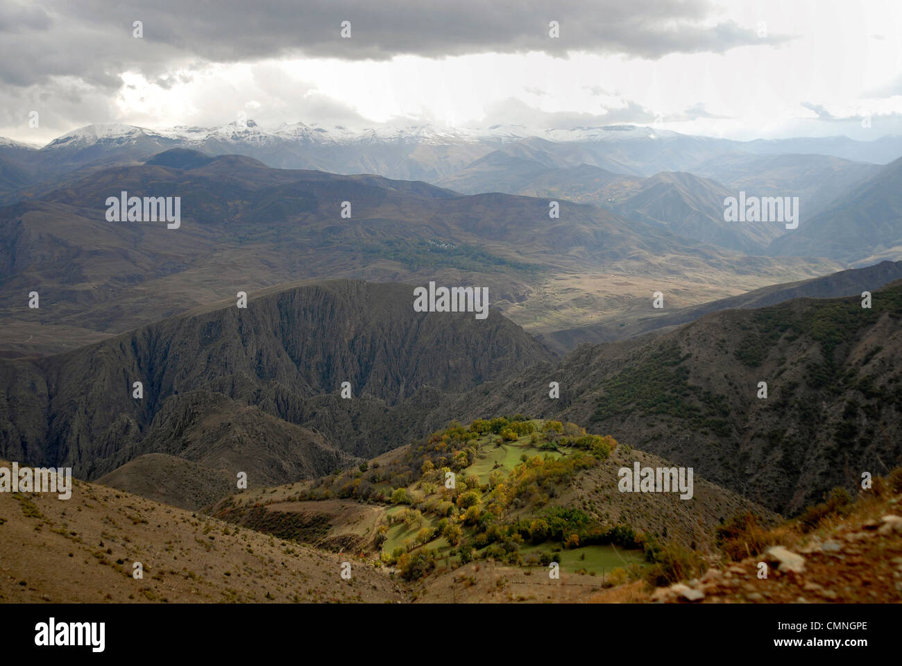 Sun shining through clouds on mountain scenery in Turkey Stock Photo ...
