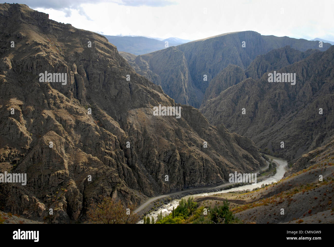 River running though a deep mountain valley Stock Photo - Alamy