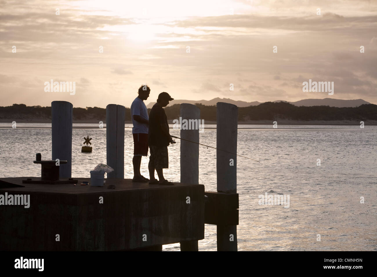 Silhouette People Fishing From Jetty High Resolution Stock Photography ...