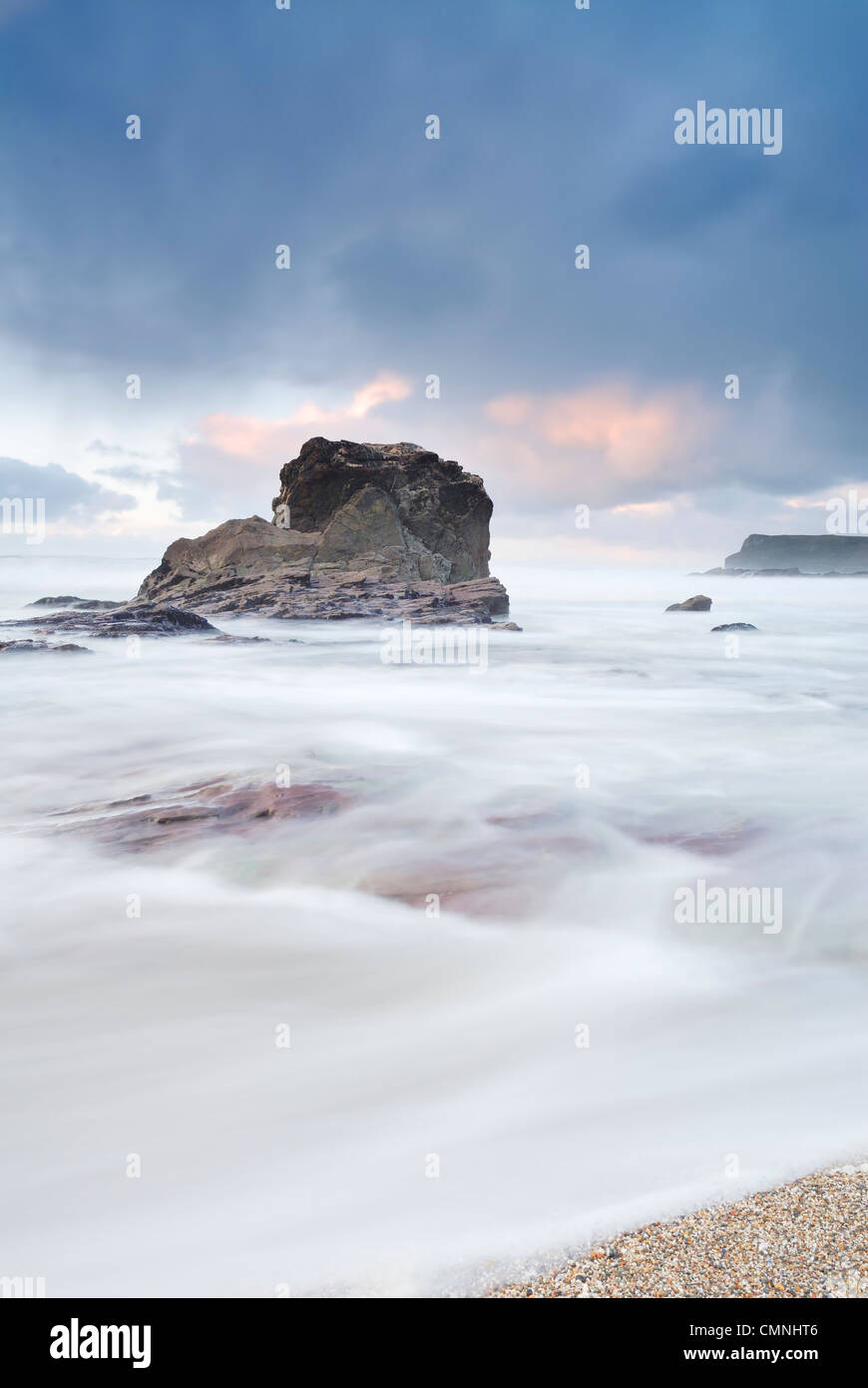 Cornish seascape shot in twilight. Motion blur in water Stock Photo - Alamy
