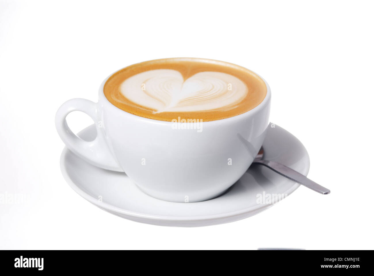 Studio shot latte cup with hear design Stock Photo - Alamy
