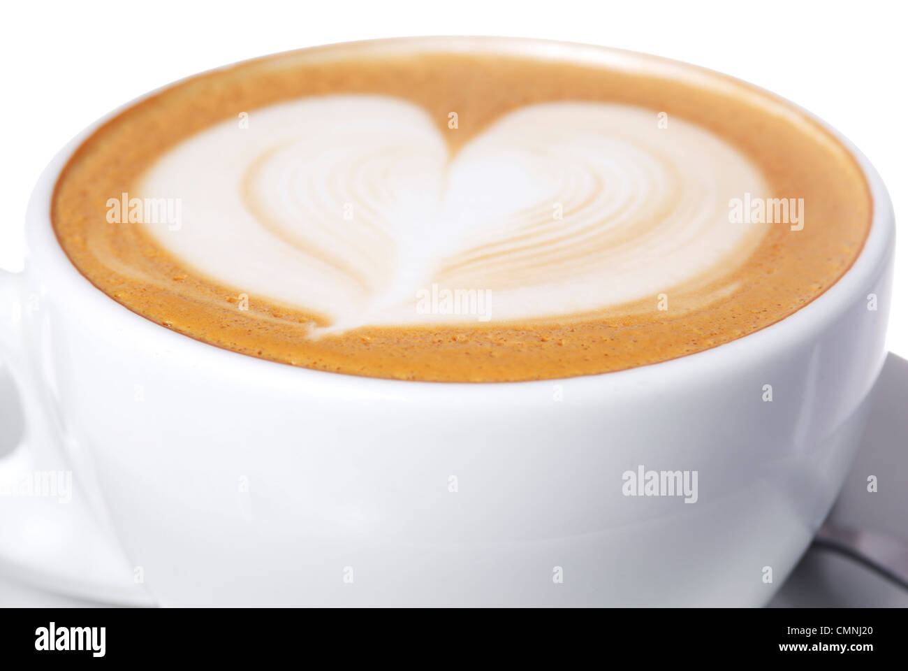 Studio shot latte cup with hear design Stock Photo - Alamy