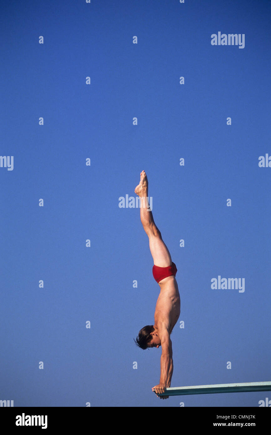 Action of male diver in the air Stock Photo - Alamy