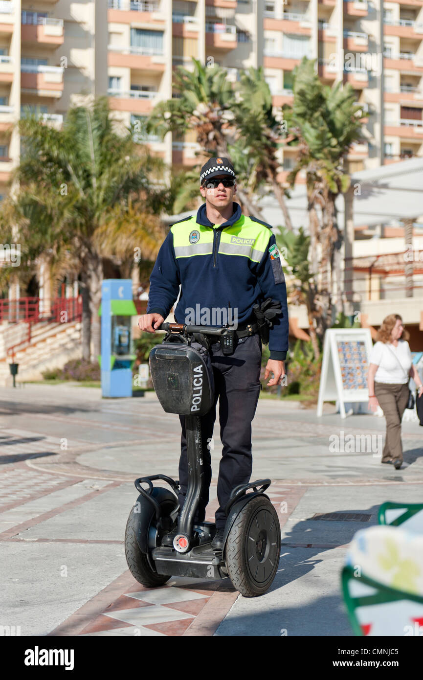 Police Officer on patrol on a Segway PT battery electric vehicle Stock ...