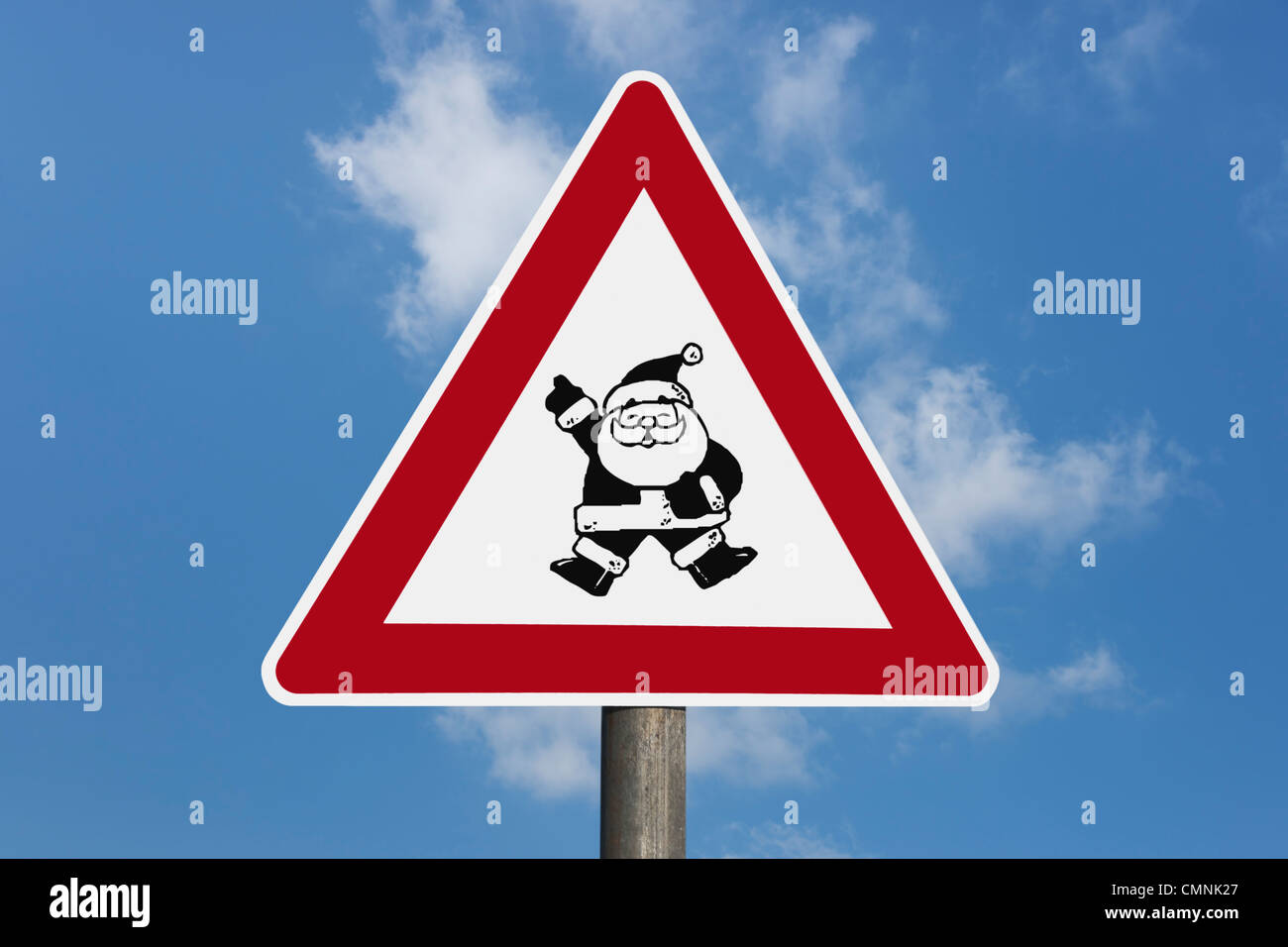 Detail photo of a danger sign with Santa Claus in the middle ...