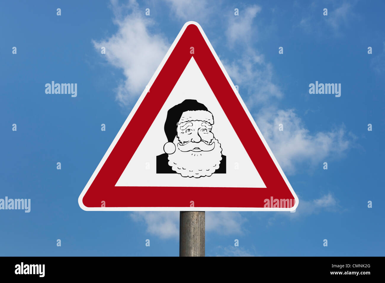 Detail photo of a danger sign with Santa Claus in the middle ...