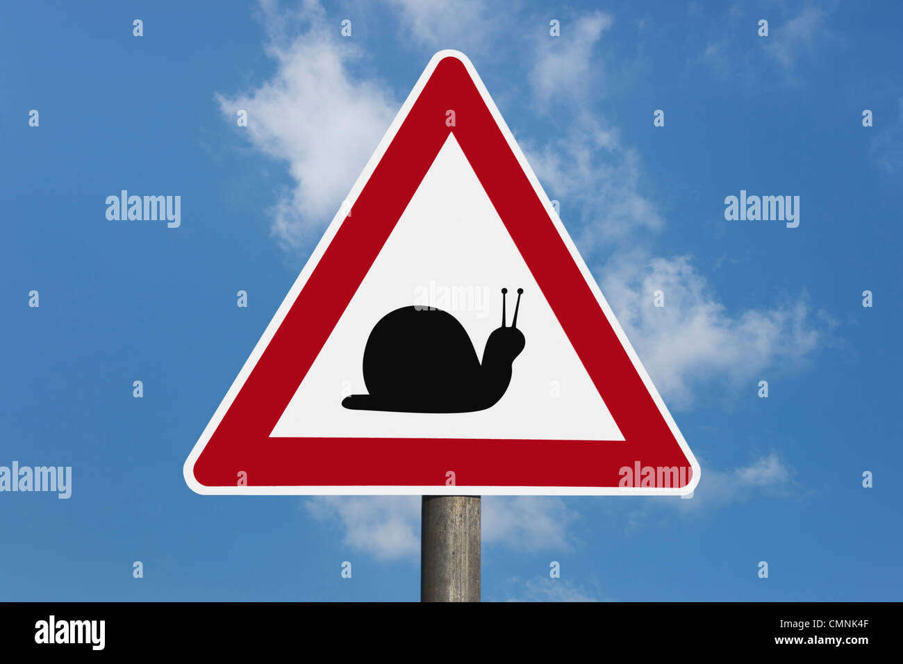 Detail photo of a danger sign with a snail in the middle, background ...