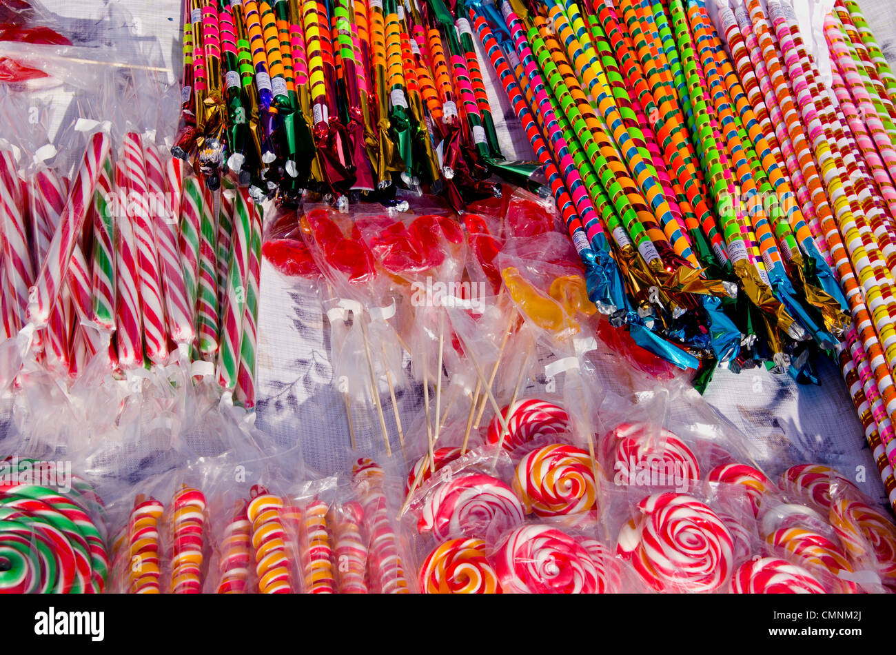 various colorful sweets in the summer fair Stock Photo - Alamy