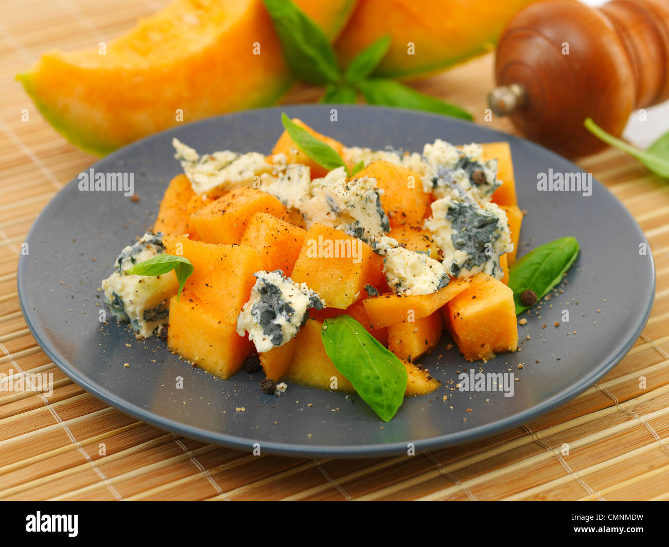 honeydew melon with basil and cheese Stock Photo - Alamy