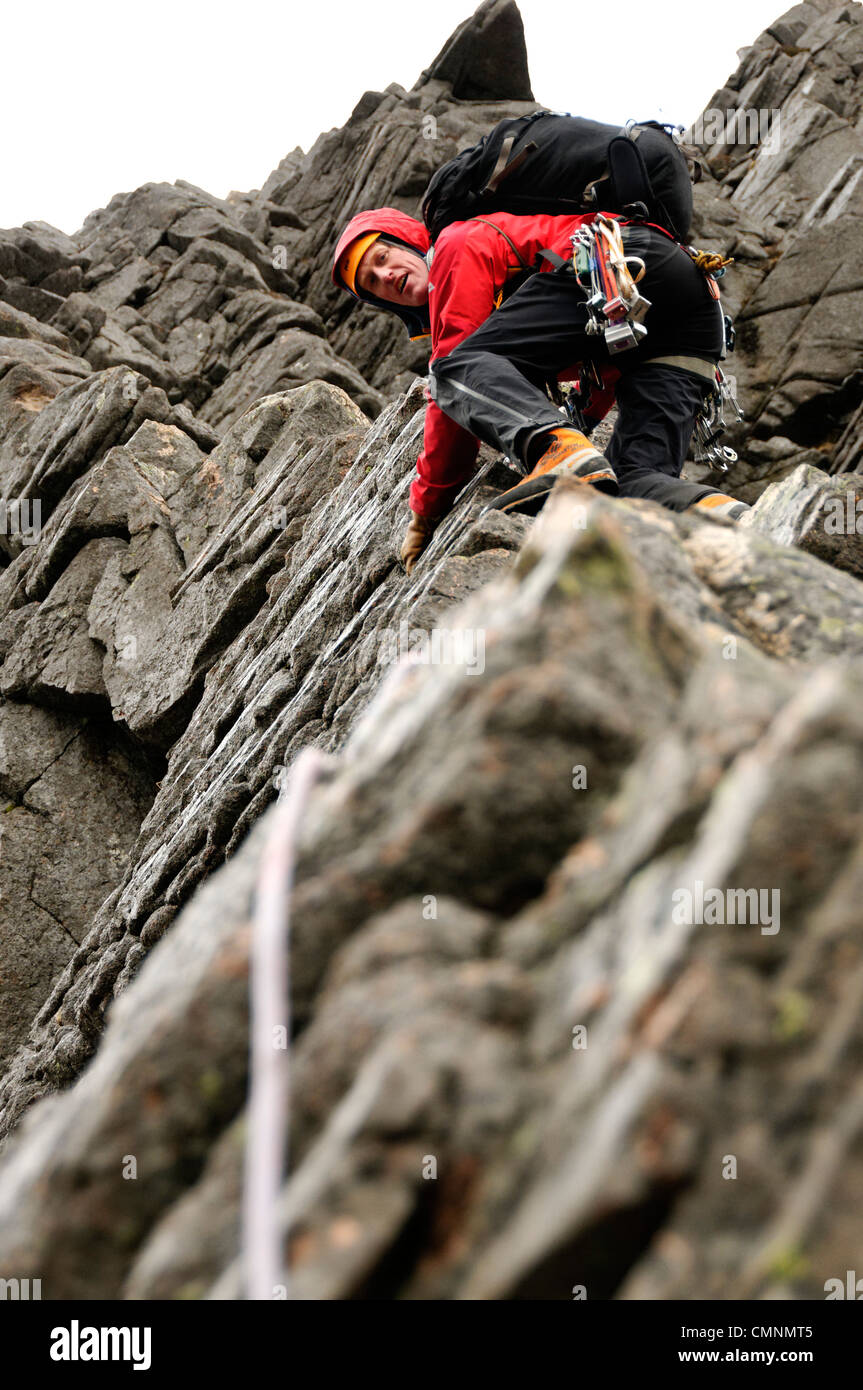 A climber leading Afterthought Arete in the Cairngorm mountains Stock ...