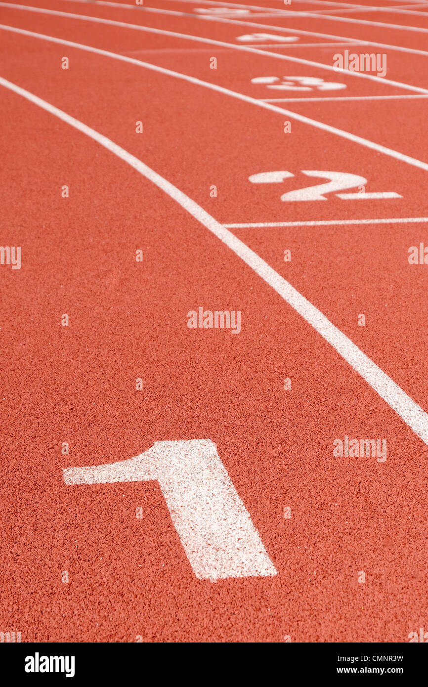 Running track curve with lane numbers Stock Photo - Alamy