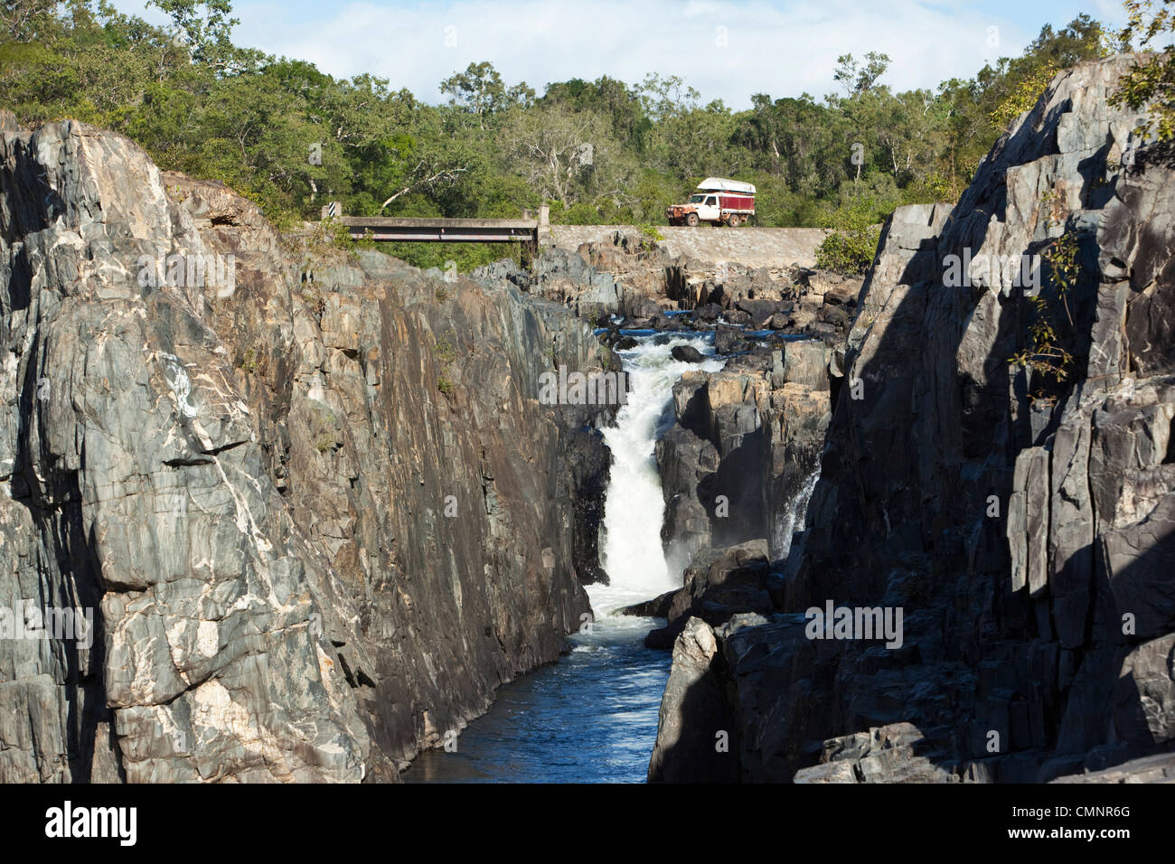 Four wheel driving crossing the Little Annan River near, Cooktown ...
