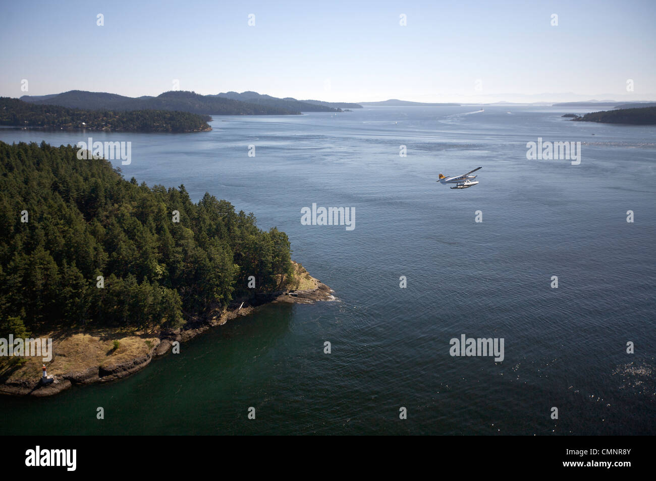 A seaplane above Mayne Island, heading for Victoria, Gulf Islands ...