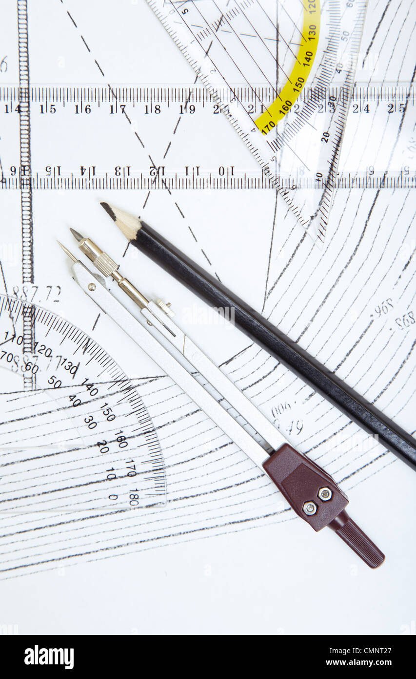 Scheme with compasses rulers and pencil. Close-up photo Stock Photo - Alamy