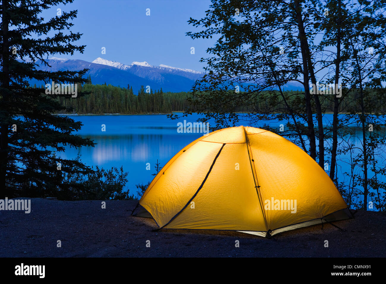 Tent and Boya Lake at dusk, Boya Lake Provincial Park, Northern British ...