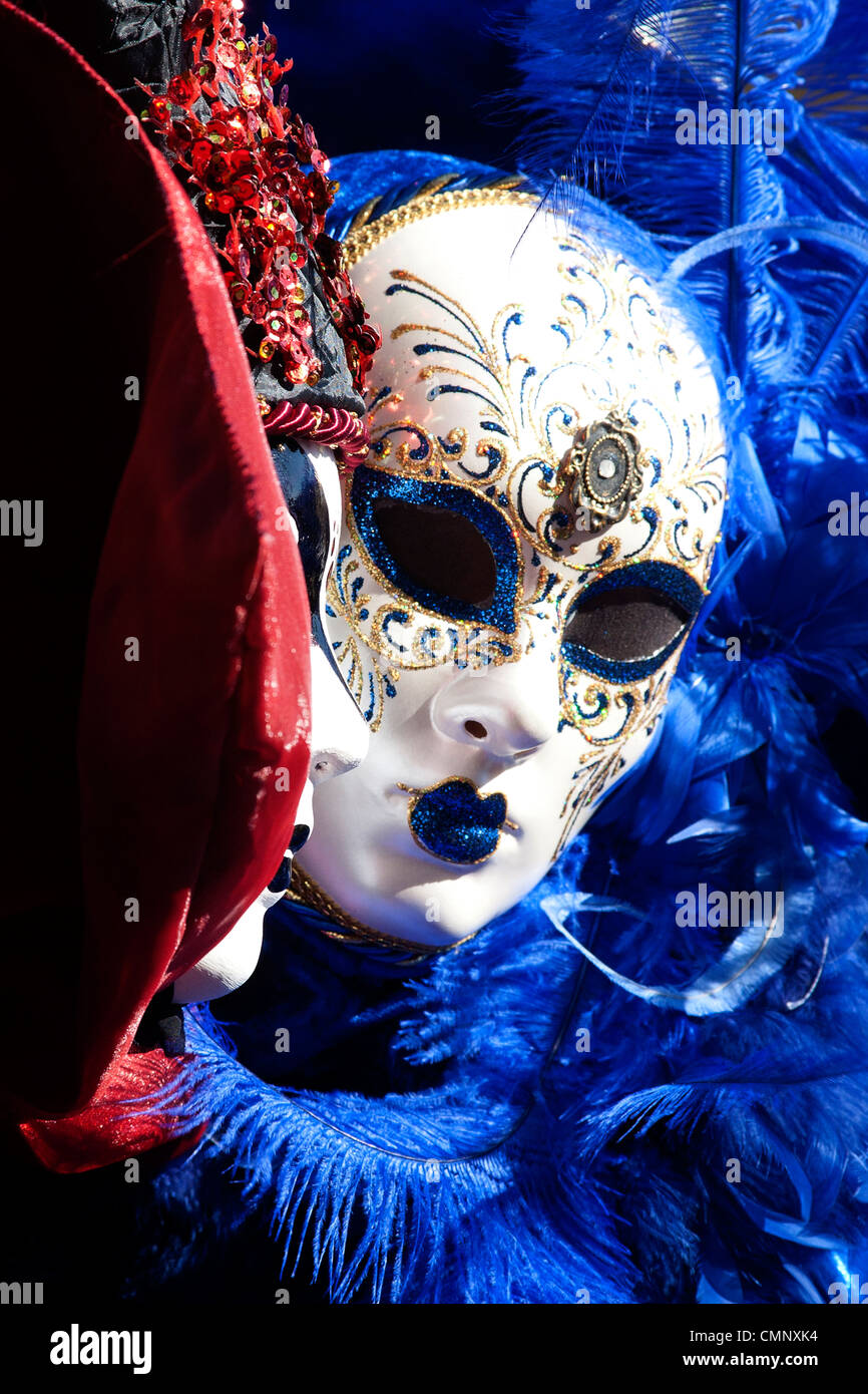 People dressed up in blue and red carnival costume for the Carnival of ...