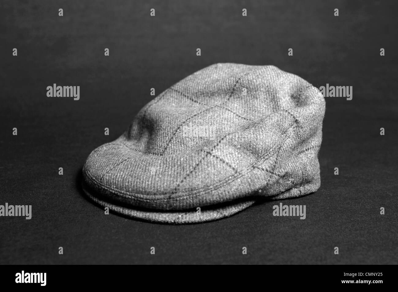 Countryman's English Flay Cap on a black background Stock Photo - Alamy