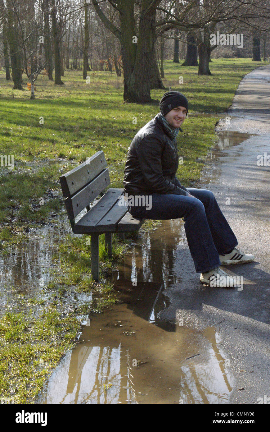 Puddle by a bench hi-res stock photography and images - Alamy