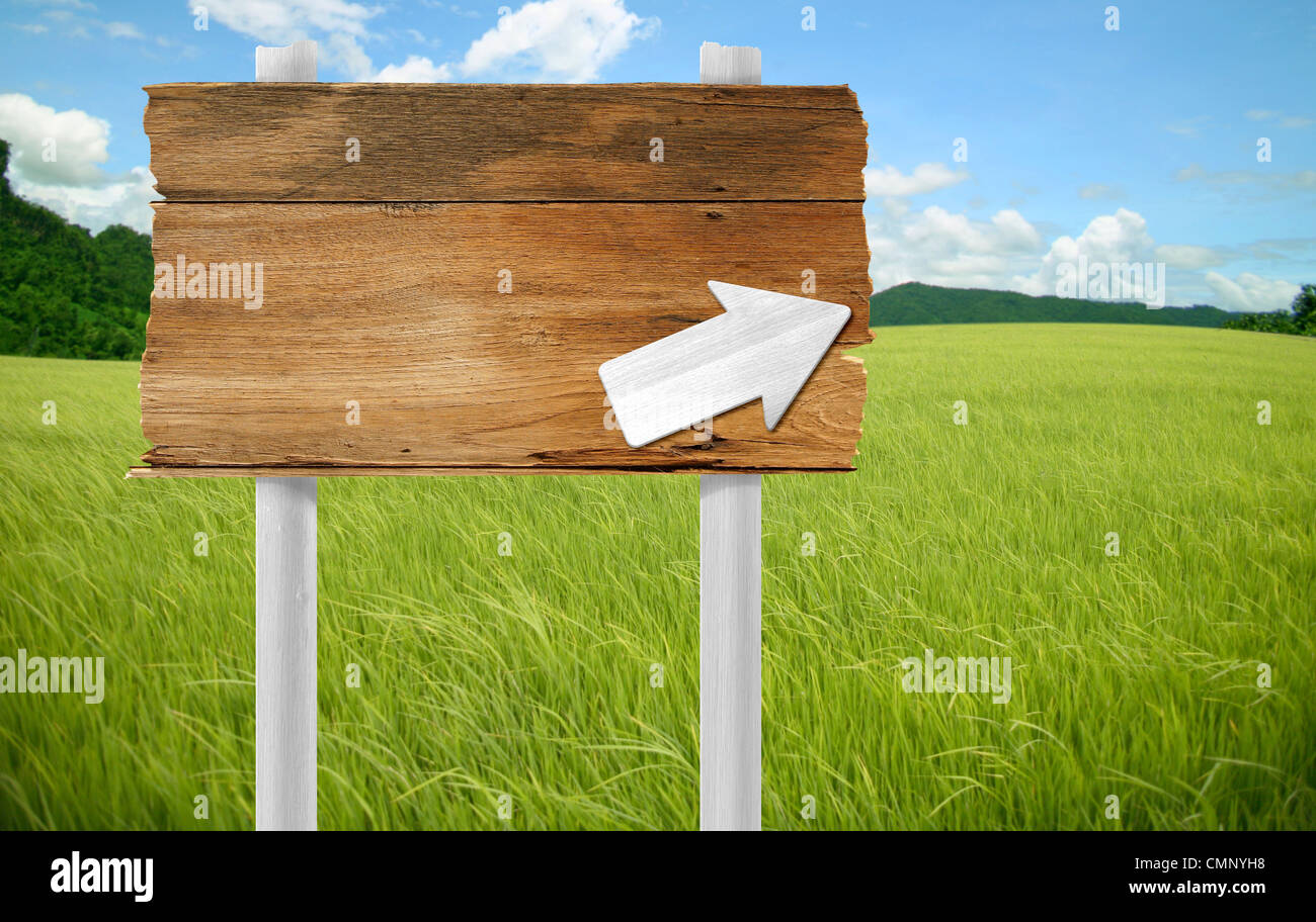 wooden sign on field grass mountain Stock Photo - Alamy