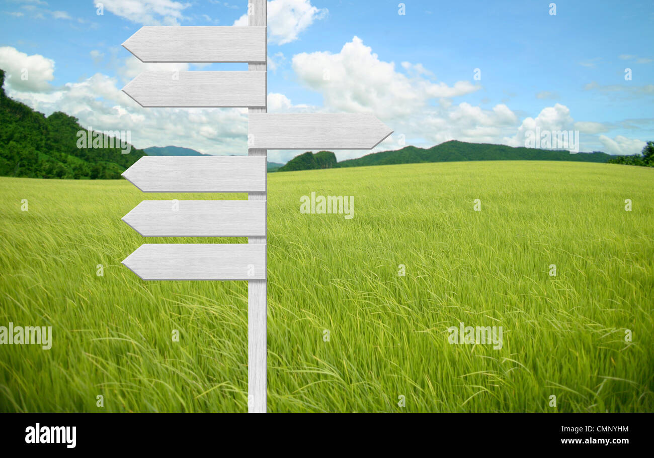 wooden sign on field grass mountain Stock Photo - Alamy