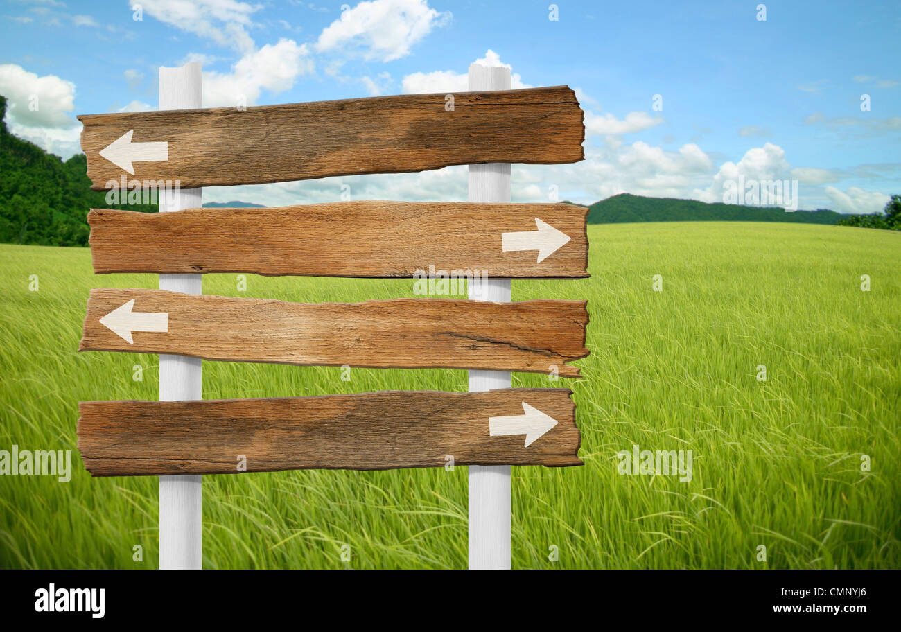 wooden sign on field grass mountain Stock Photo - Alamy
