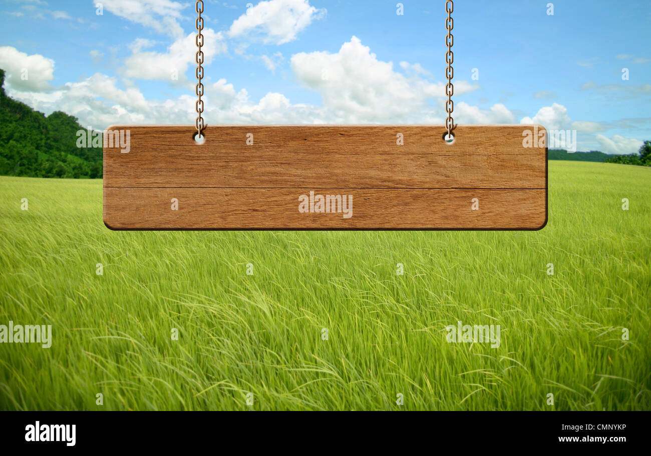 wooden sign on field grass mountain Stock Photo - Alamy