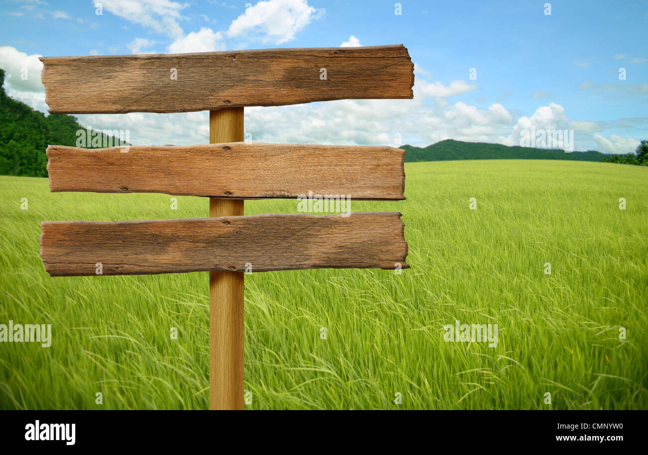 wooden sign on field grass mountain Stock Photo - Alamy