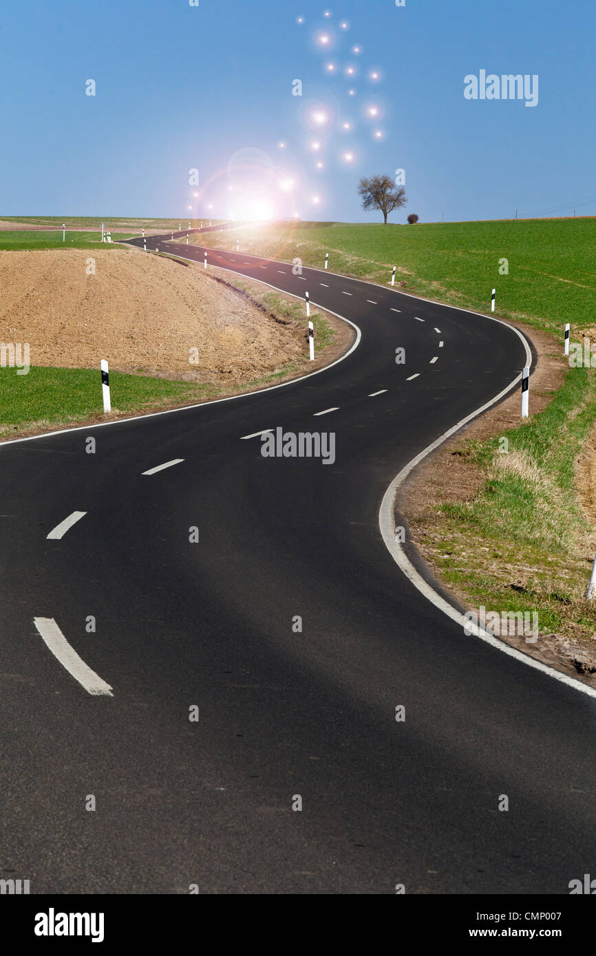 Winding Long road in the countryside Stock Photo - Alamy